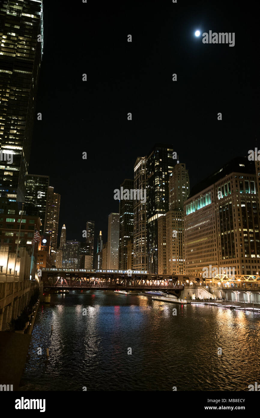 Chicago city riverwalk promenade at night with vintage drawbridge ...
