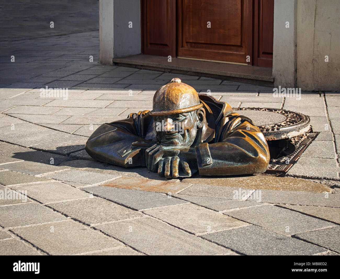 Man work cumil statue in hi-res stock photography and images - Alamy