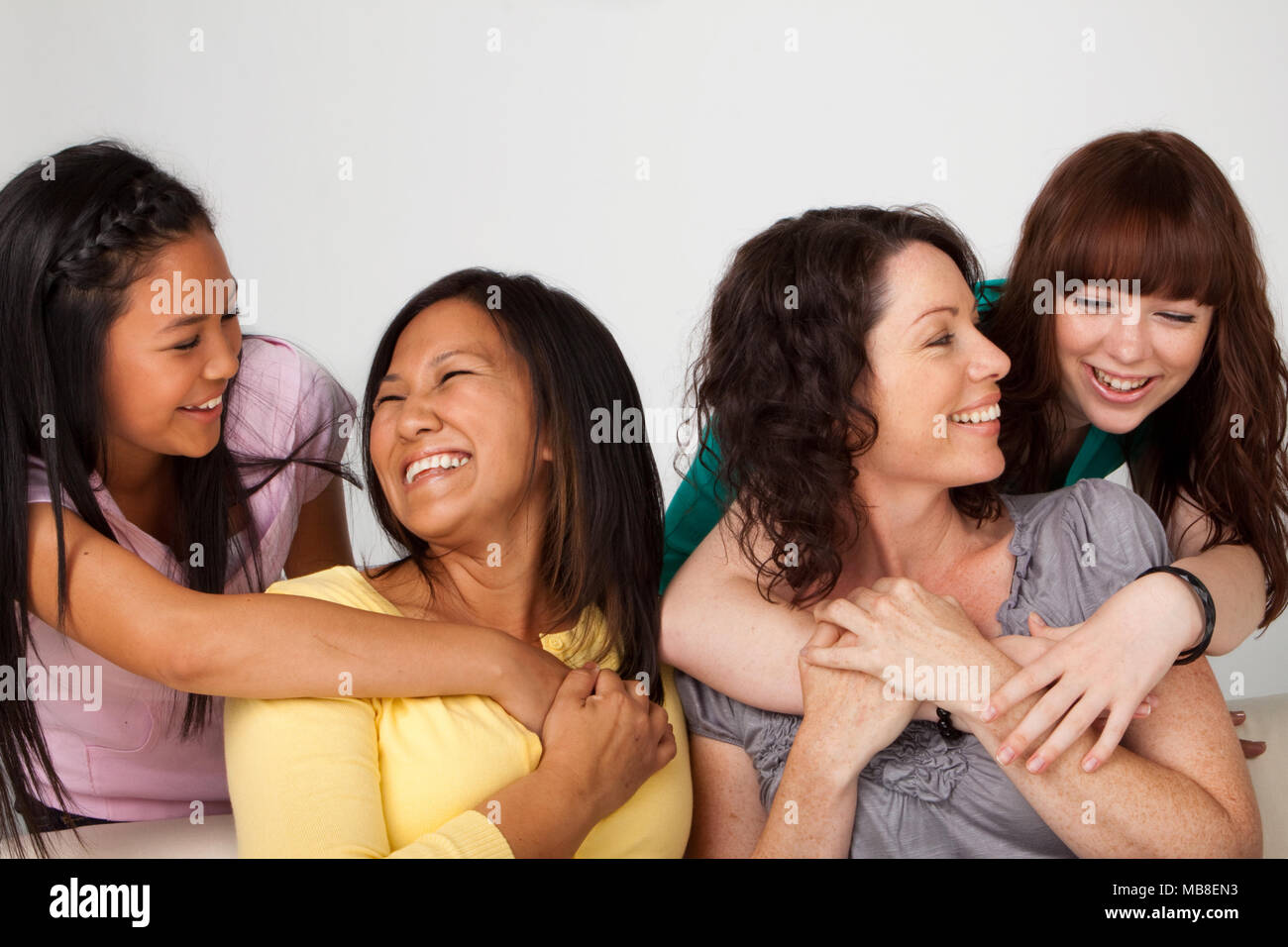 Diverse group of mothers and daughters Stock Photo - Alamy