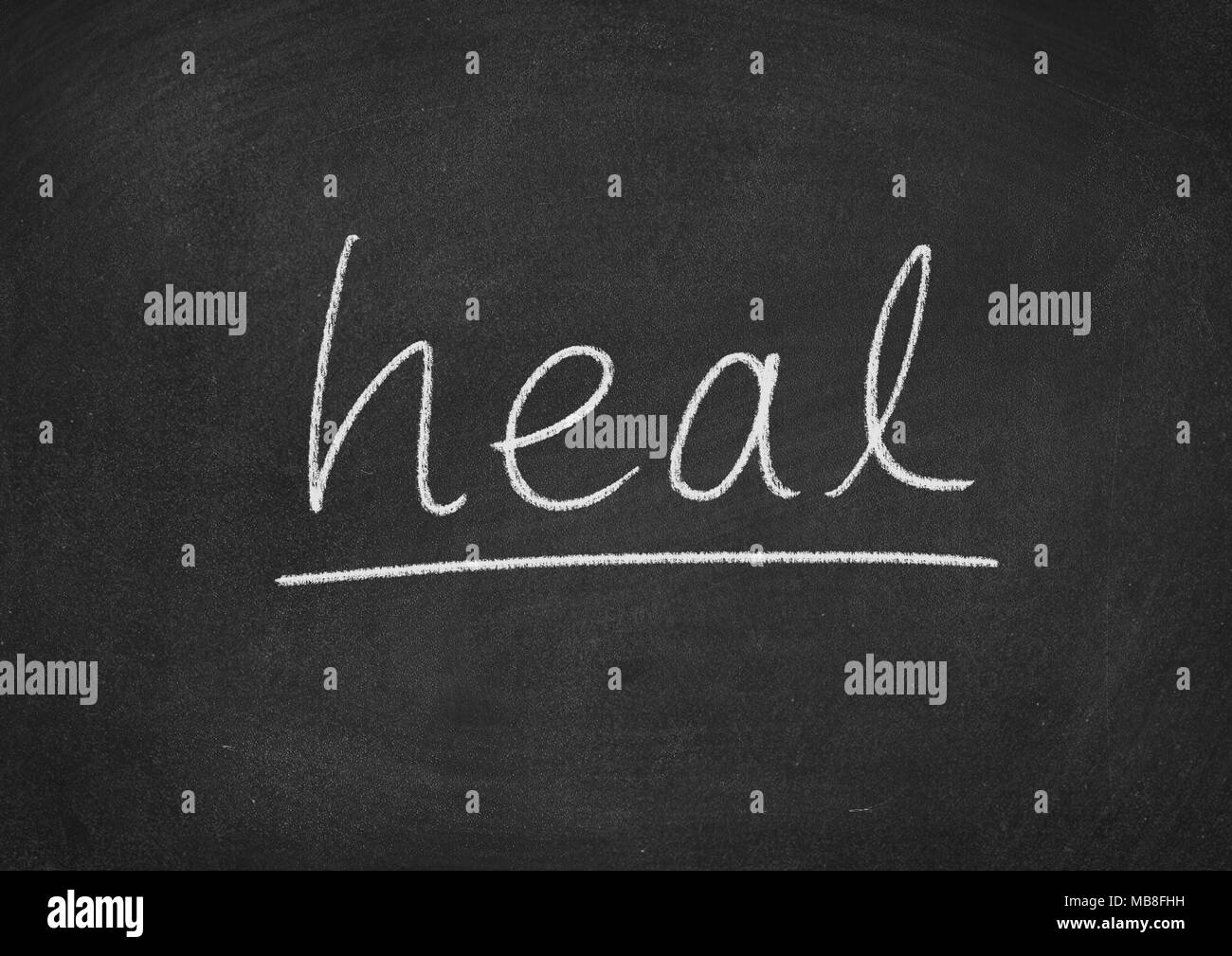 heal concept word on a blackboard background Stock Photo - Alamy