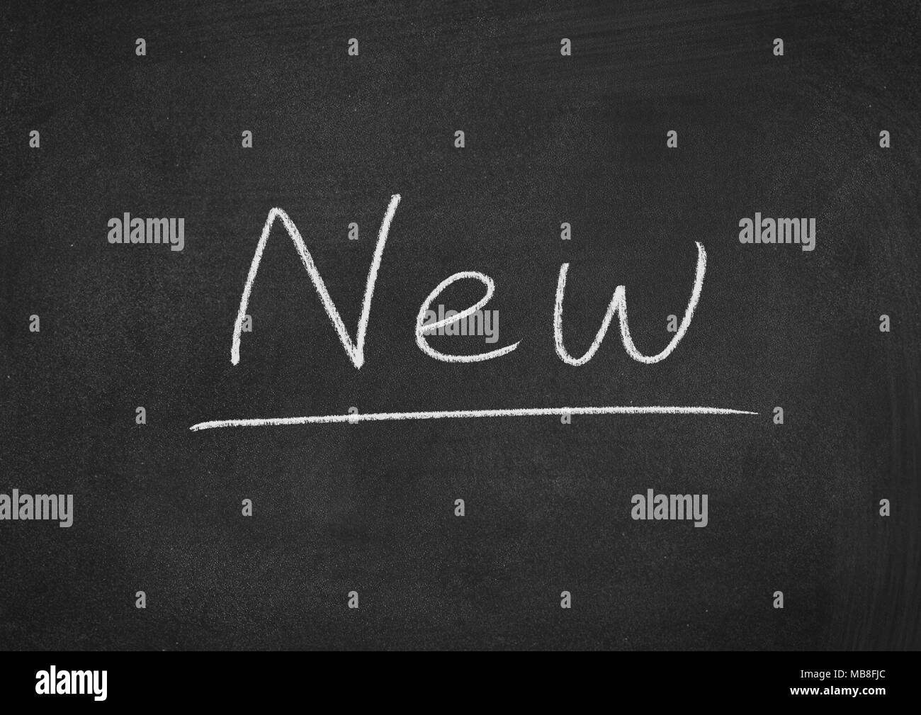 new concept word on a blackboard background Stock Photo - Alamy