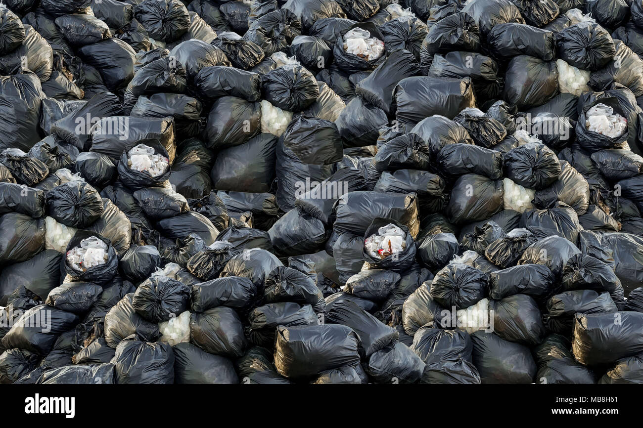 Close up many garbage bags and waste background Stock Photo - Alamy