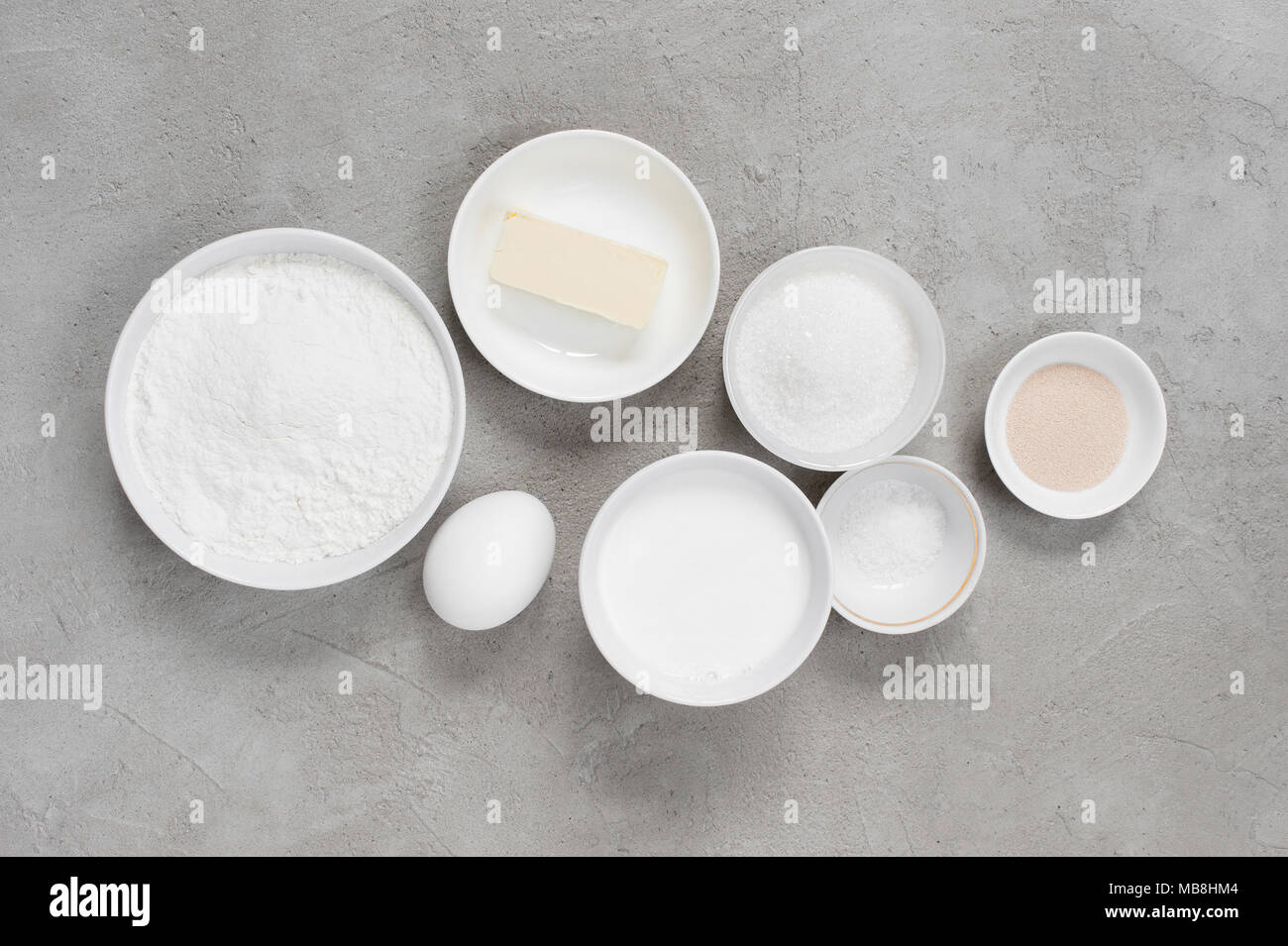 Ingredients for baking on the textured gray table. Top view Stock Photo ...