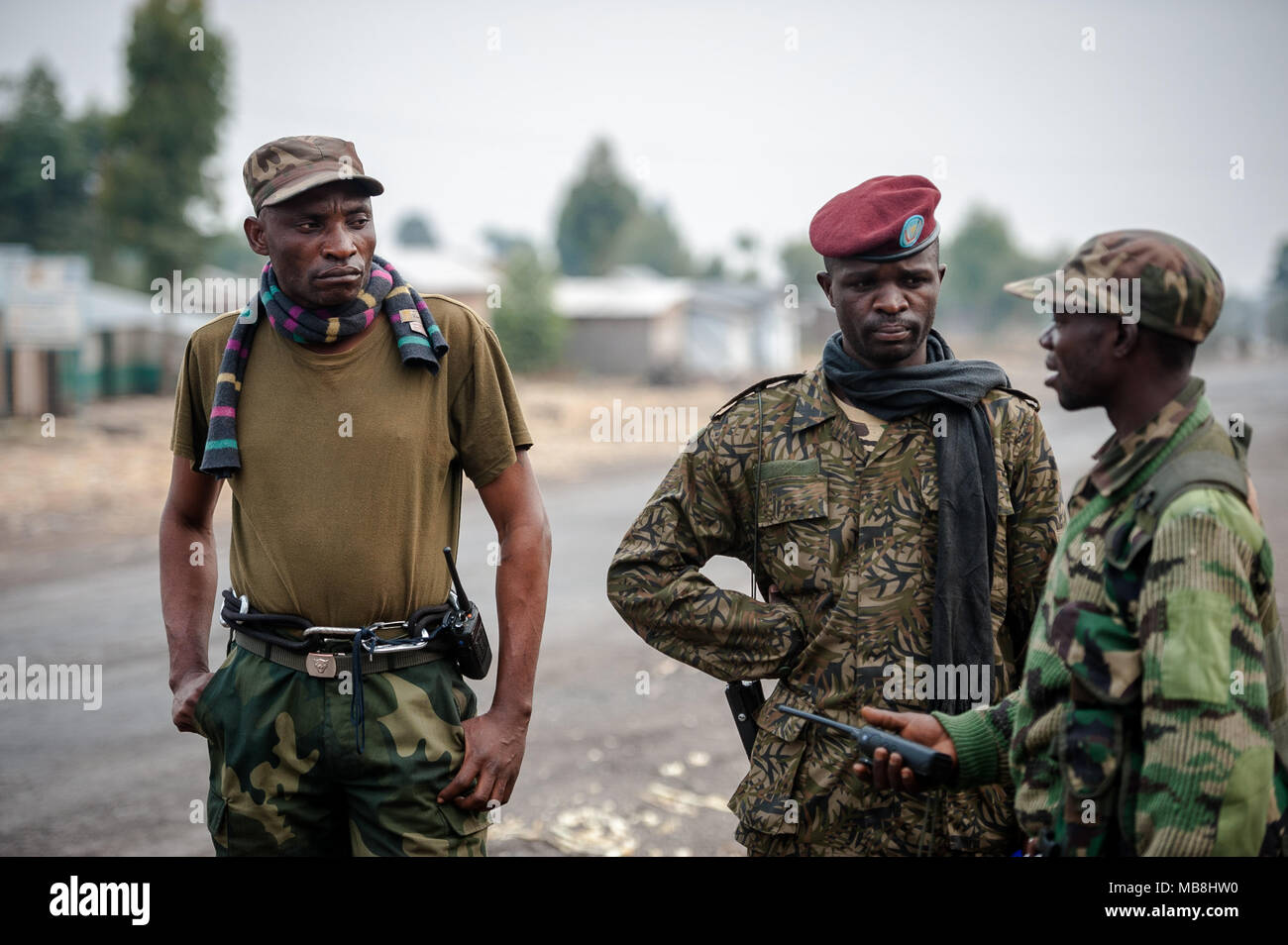 Officers meet with a soldier during the conflict between the DRC and ...