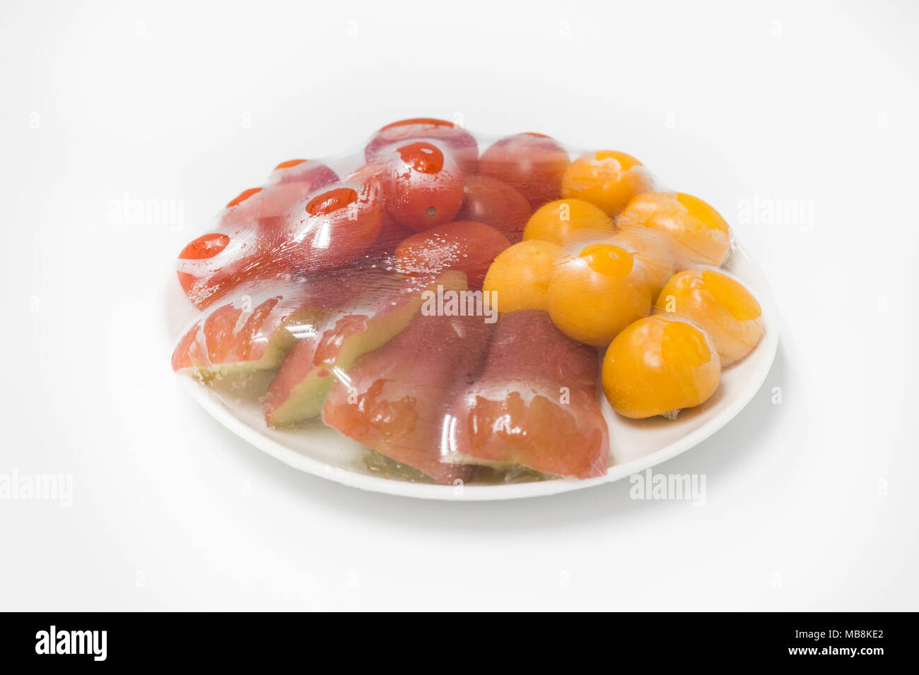 fruits that are wrapped with plastic film preservation to maintain the ...