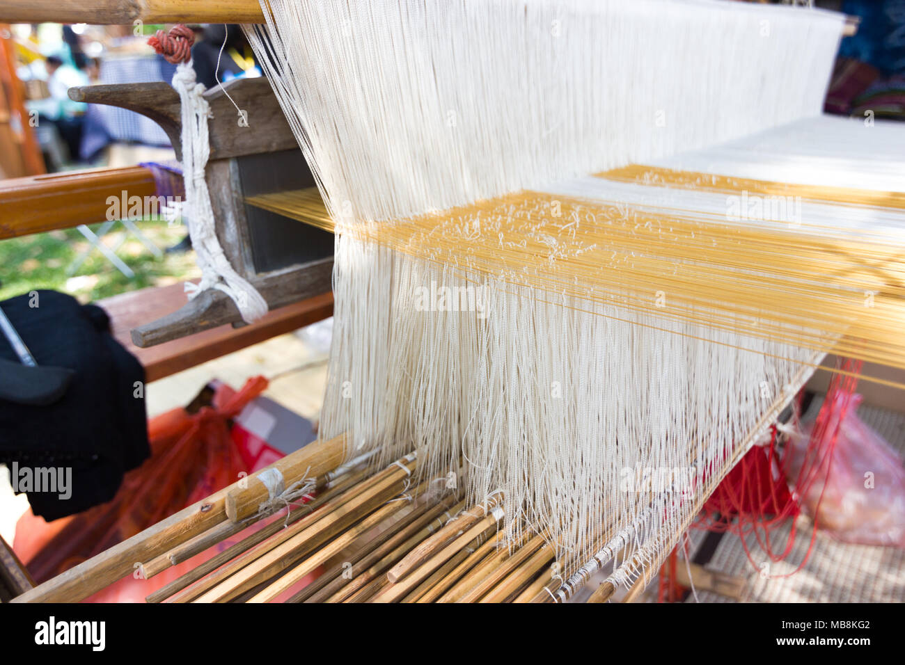 Household Loom weaving - Detail of weaving loom for homemade silk or ...