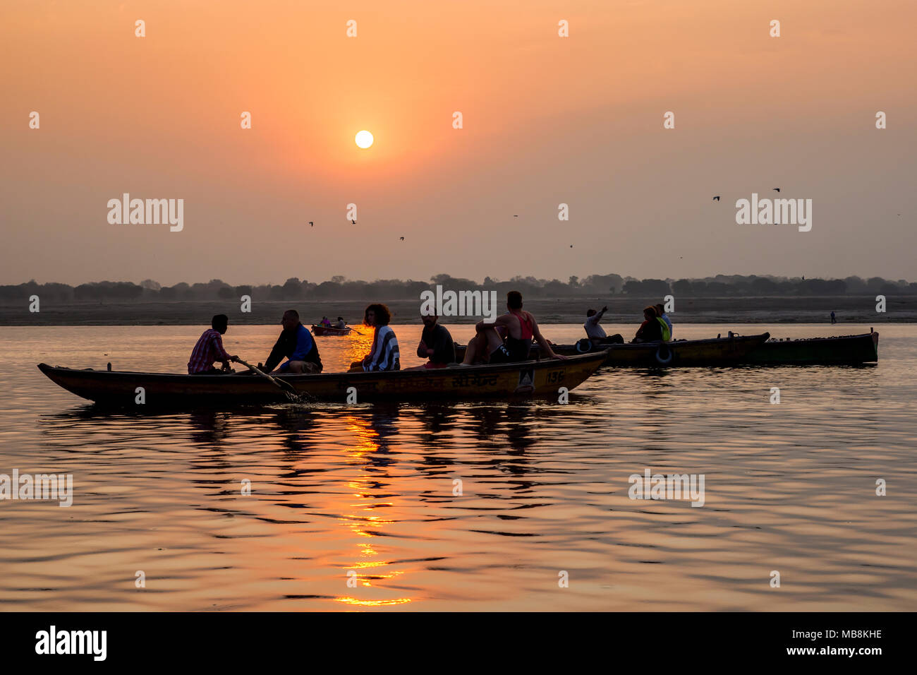 Varanasi, India. Tourists in Row boats on the Ganges river Stock Photo ...