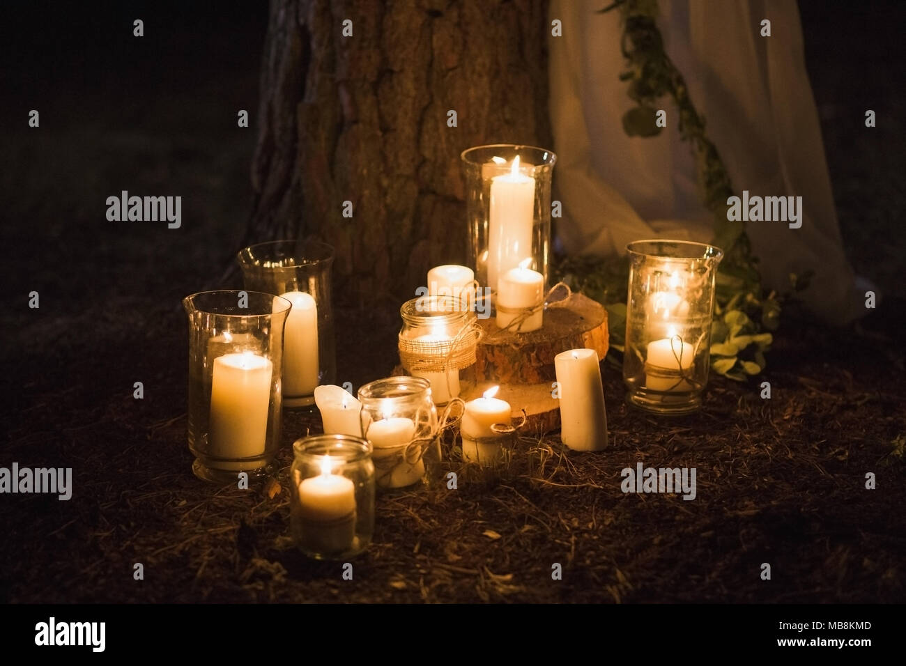 Many glass candles hi-res stock photography and images - Alamy