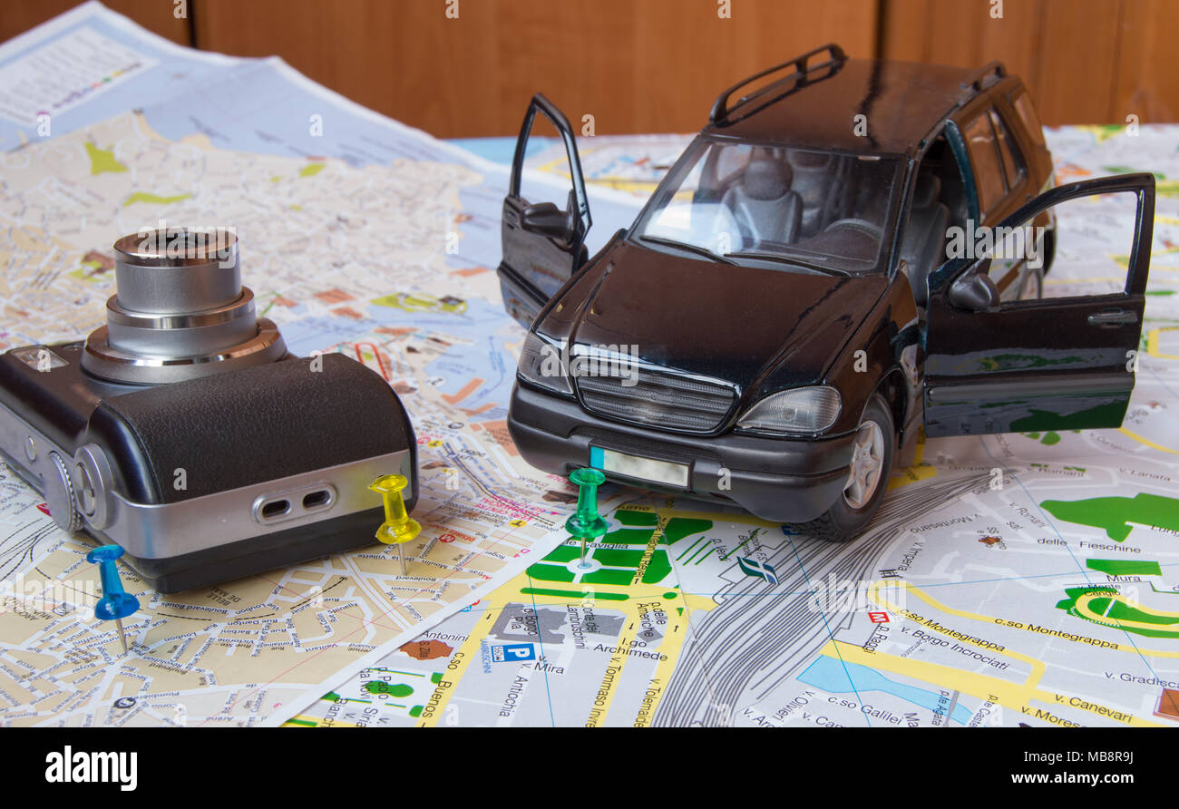 Idea for summer car travel Map with sunglasses, planning the vacation ...