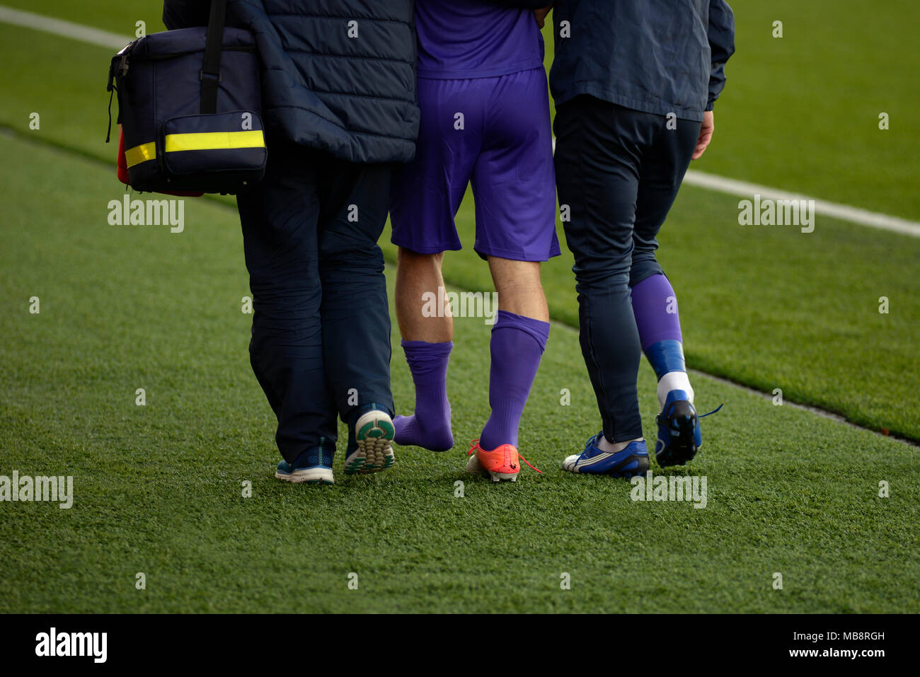 soccer player have real pain injury accident on football game Stock ...