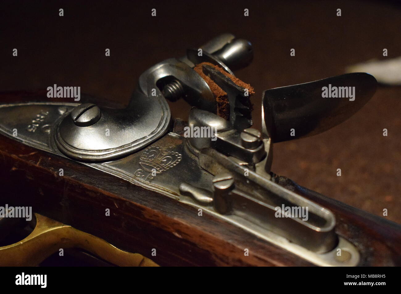 Napoleonic flintlock weapons laid out for the audience to interact with ...
