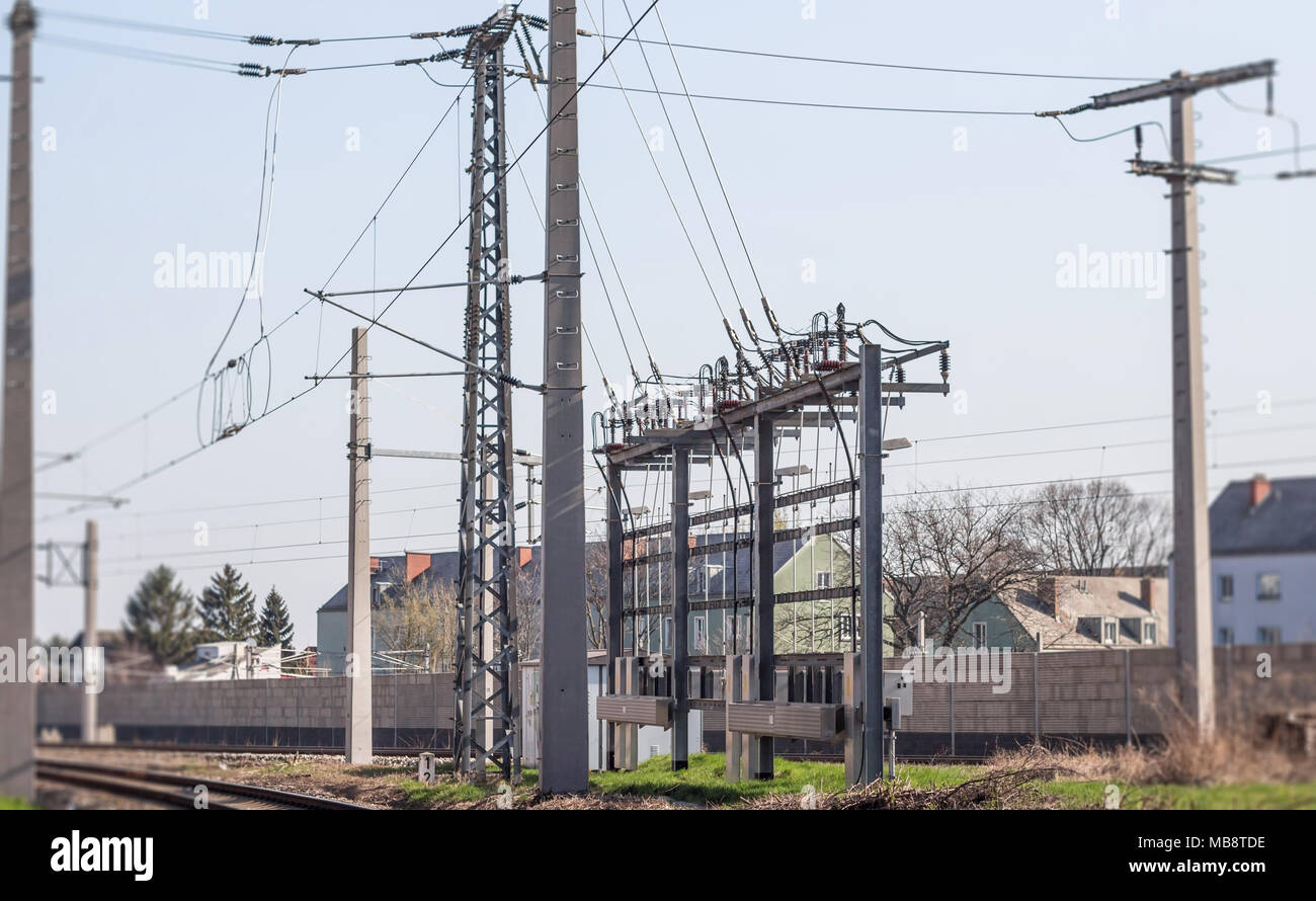 Electric Train power transmission poles and wires above tracks Stock ...