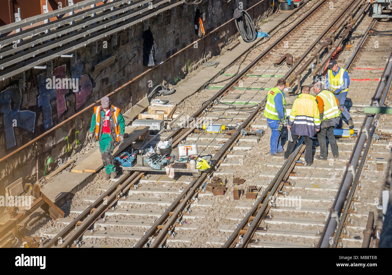 Railroad workers in metro channel working on renovation, Vienna Austria ...