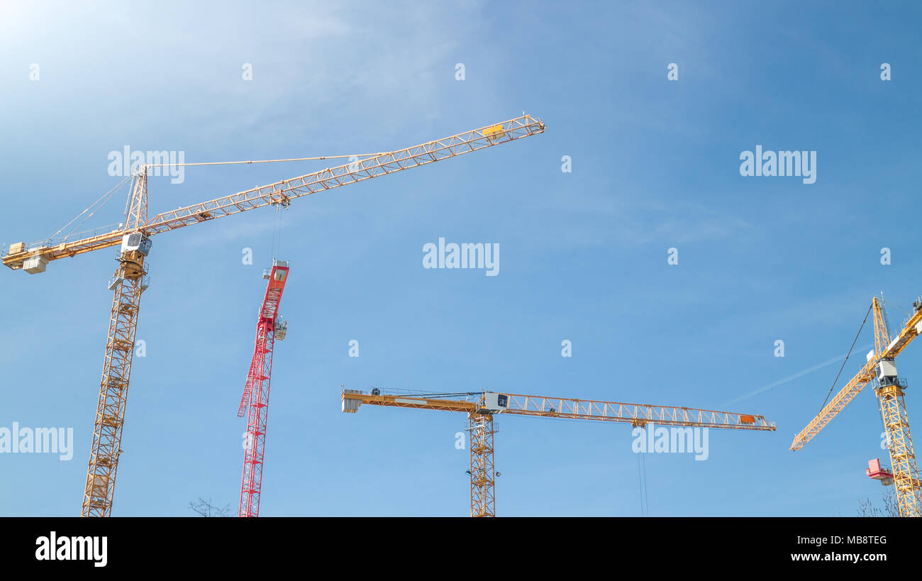 Construction site with 4 cranes Stock Photo - Alamy