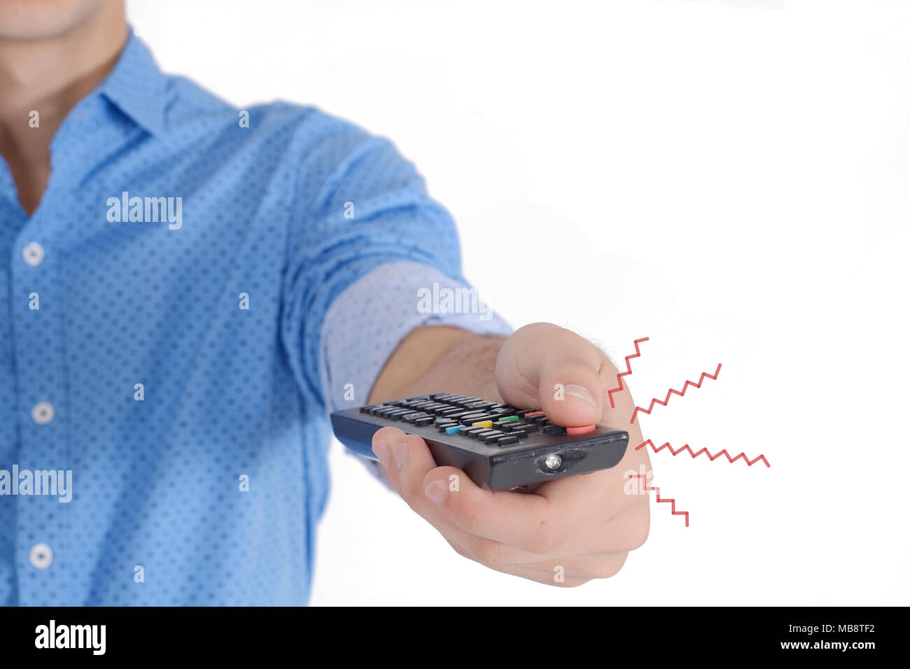 Young man watchng tv. Focus on remote control. Isolated white ...