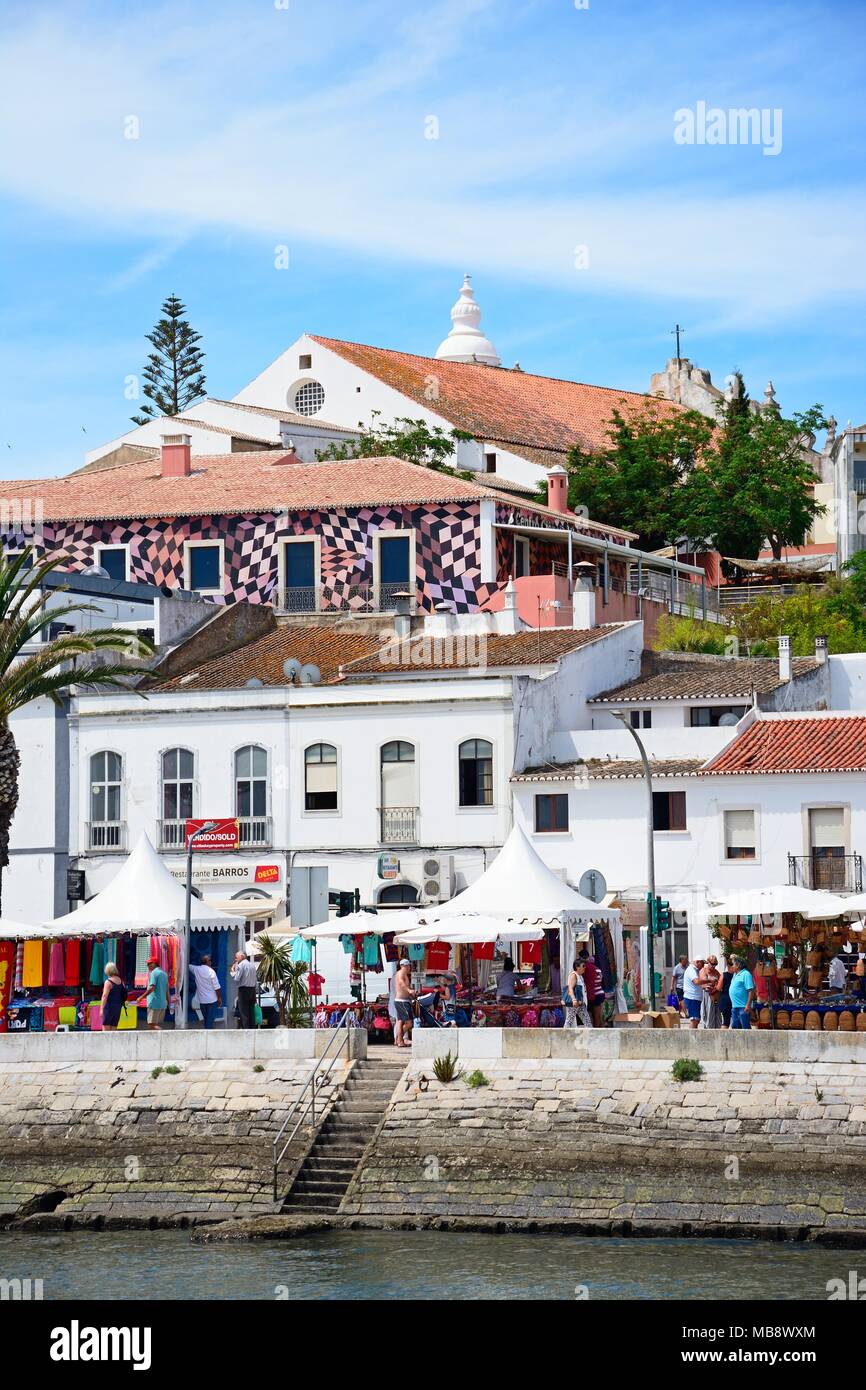 View of the town and waterfront buildings with the outdoor market on ...