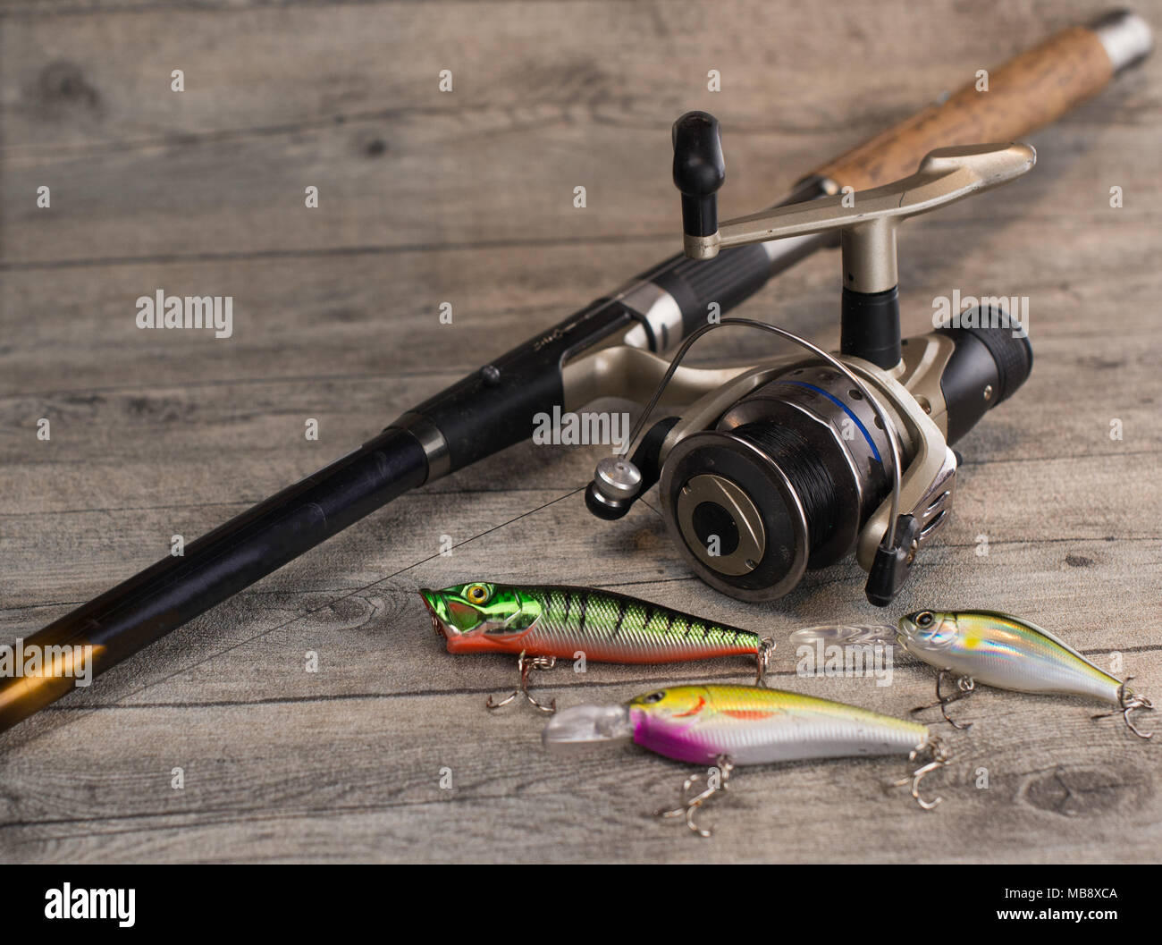 fishing tackle on a wooden table Stock Photo - Alamy