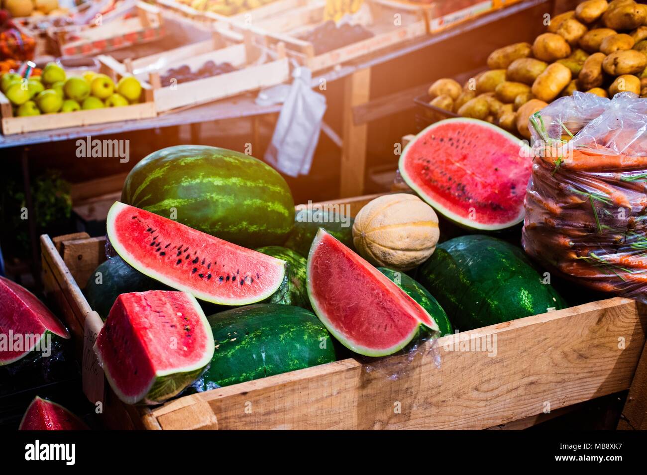 Red fresh watermelons on outdoor market stall Stock Photo - Alamy