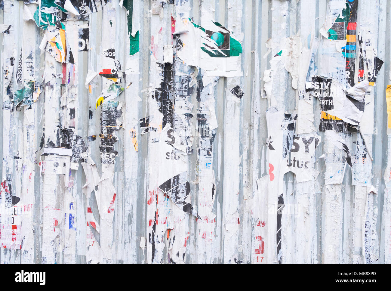 abstract grunge background with old torned paper advertisements parts ...