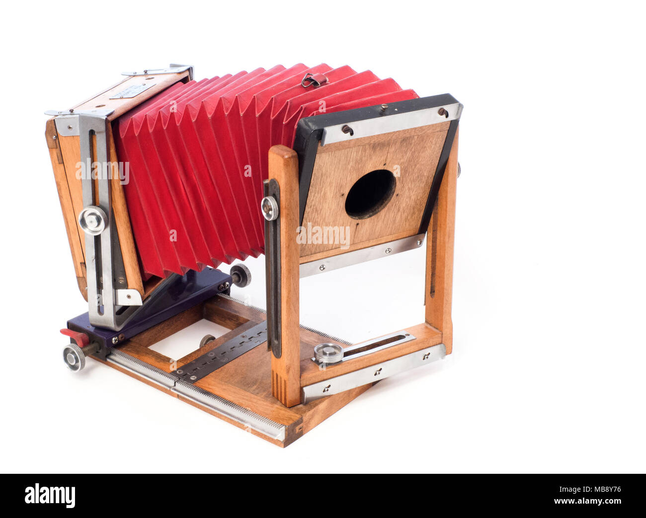A folded Burke & Jame4x5 format flatbed view camera with red bellows ...