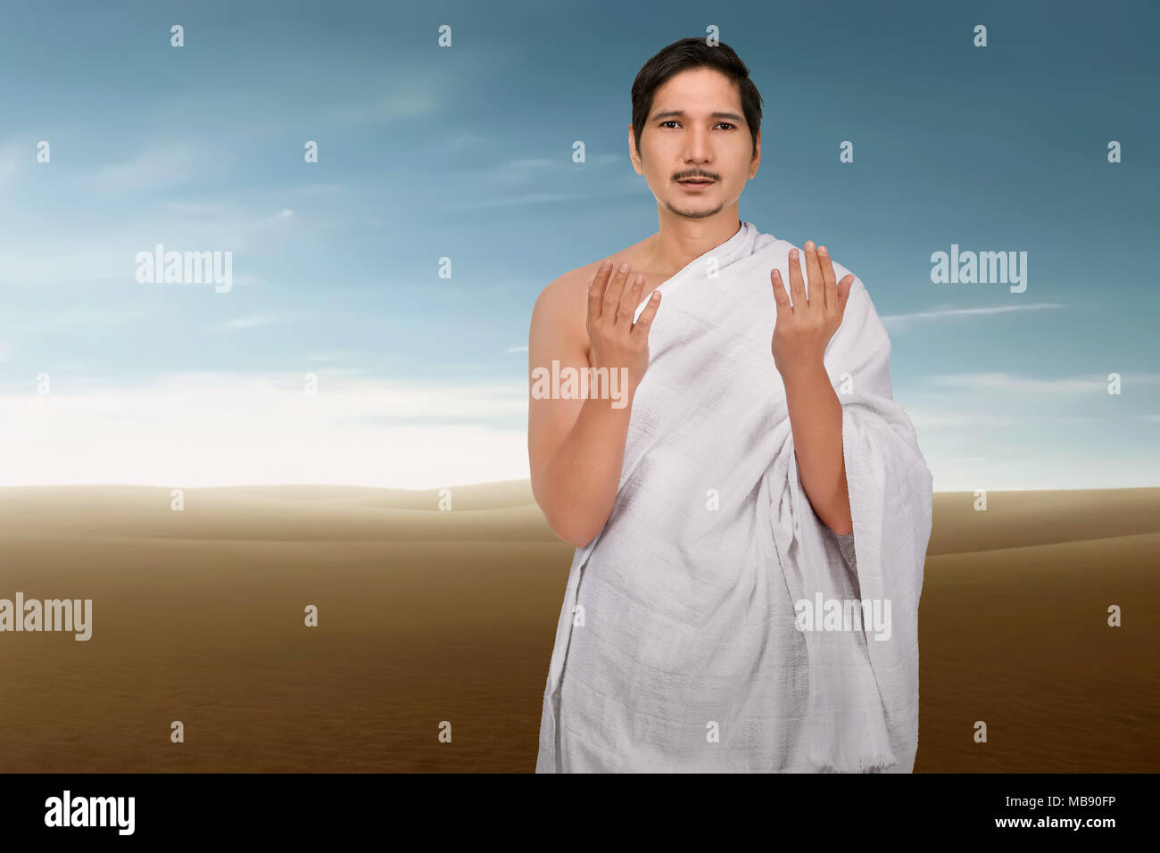 Young asian muslim man with traditonal dress (ihram) ready for hajj ...