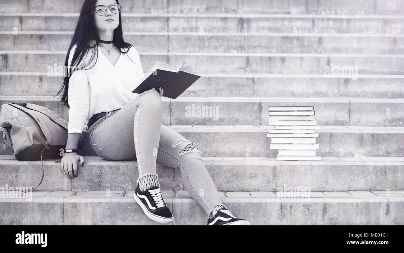 Young girl student on the street Stock Photo - Alamy