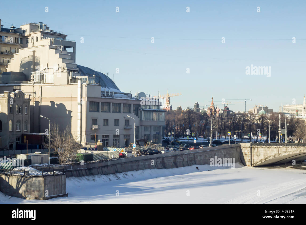 View of Moscow in winter. Ice on the Moscow River. The golden dome of ...