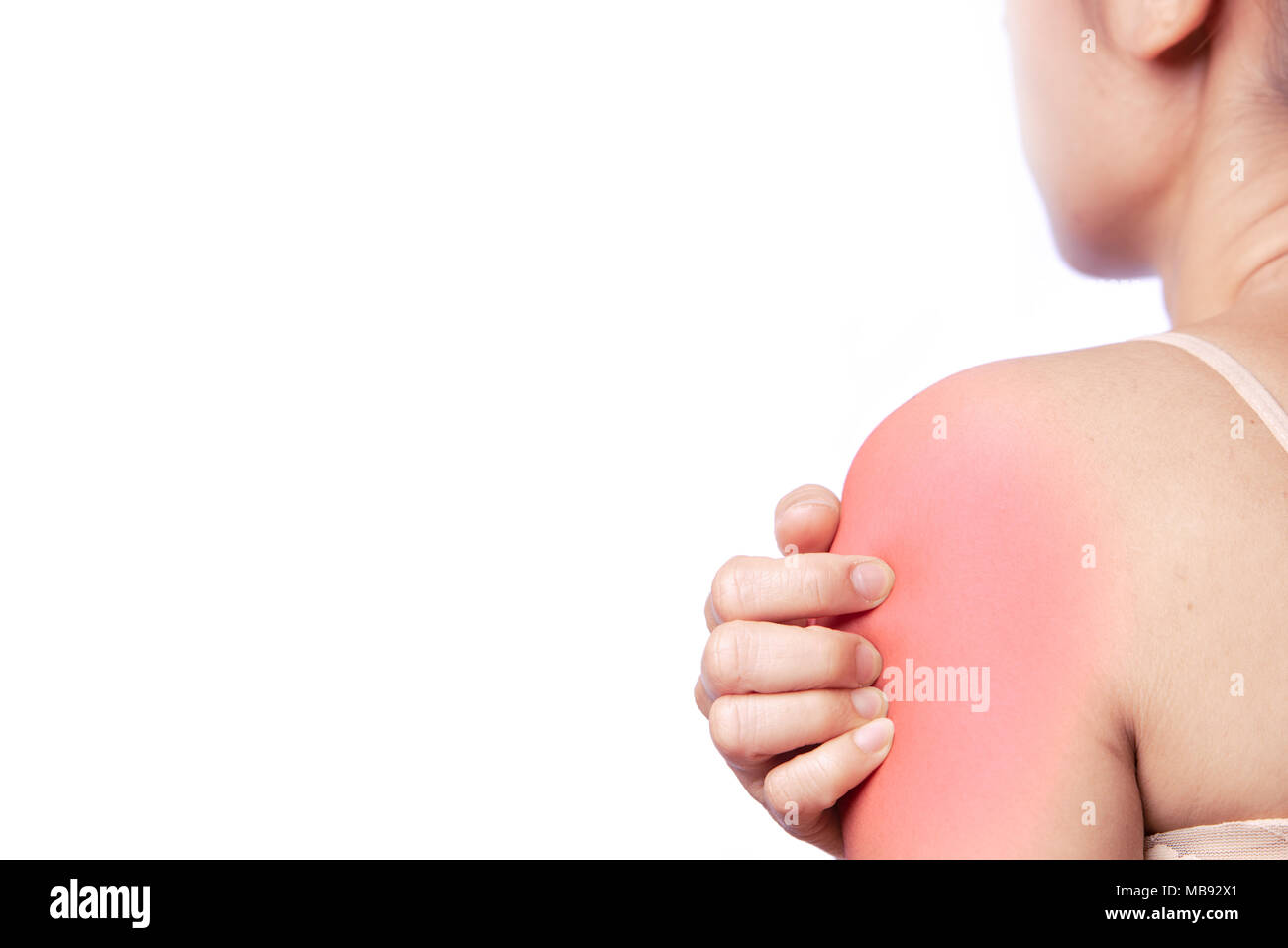 Asian woman scratching on skin around left shoulder on white background ...