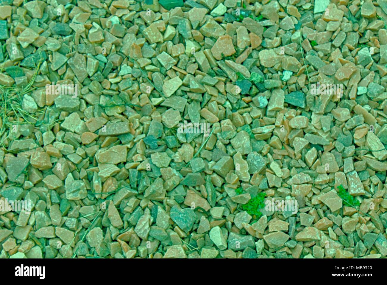 Shaded spruce Flintstone pebbles structure of red stone for background ...
