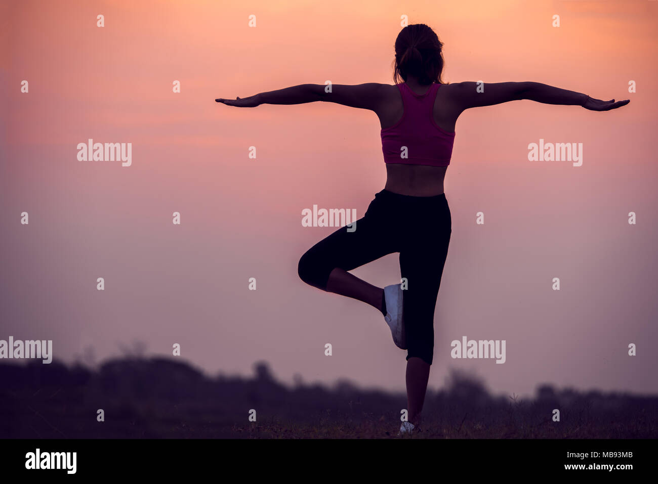 woman exercise with sunset, asian woman stretching muscle before ...