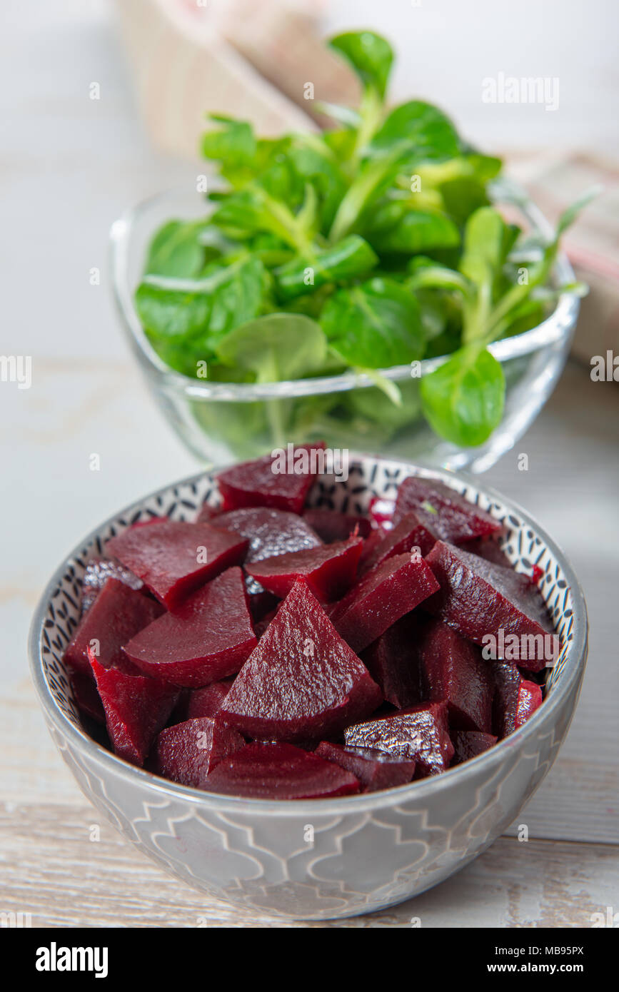 red beetroot cutting into pieces in a bowl Stock Photo - Alamy