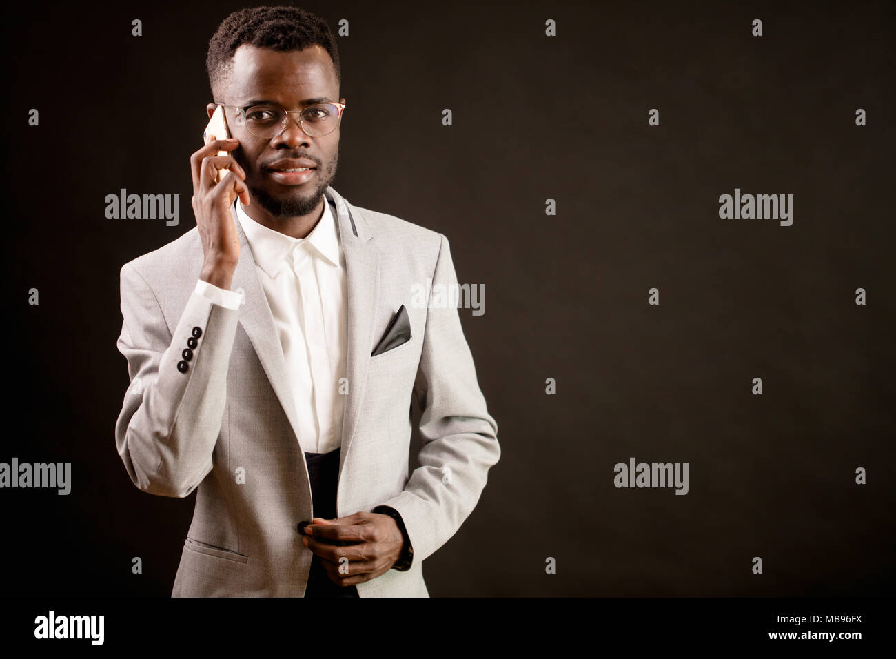 Phone thinking guy on black hi-res stock photography and images - Alamy