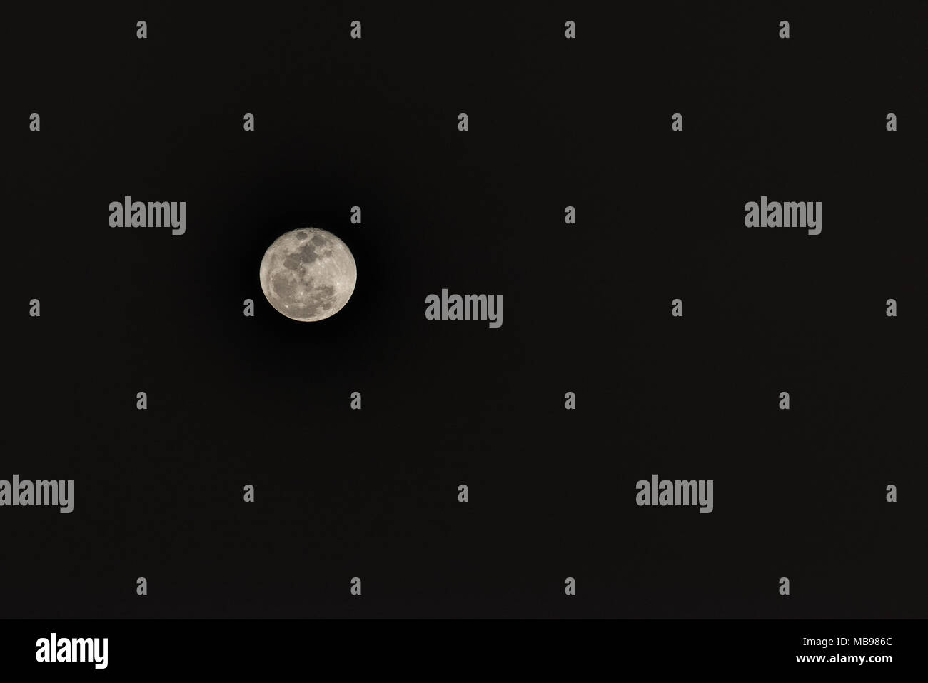 The full Moon on a supermoon dark night sky natural phenomenon Stock ...
