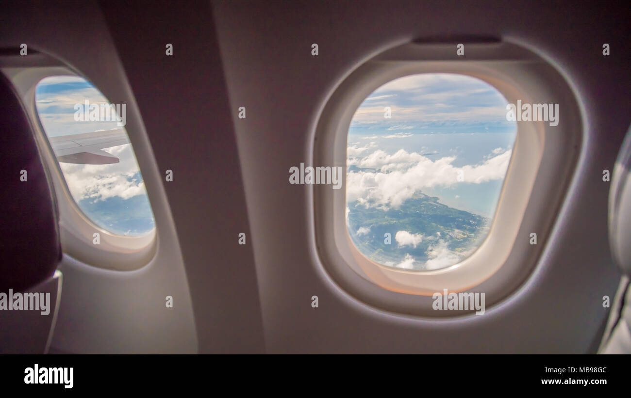 Airplane seat and window inside an aircraft Stock Photo - Alamy