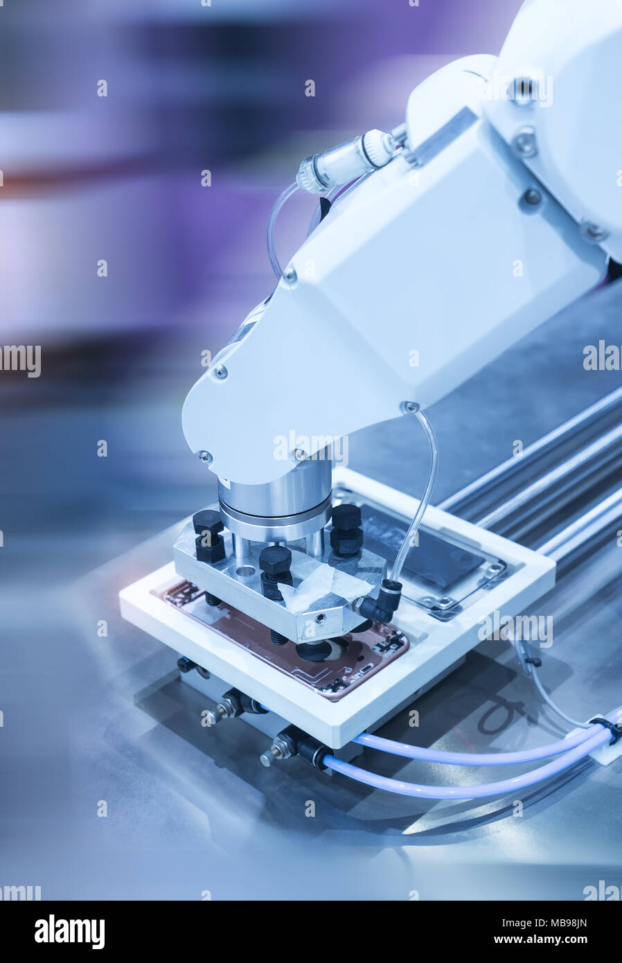 intelligence machine working in phone factory Stock Photo - Alamy