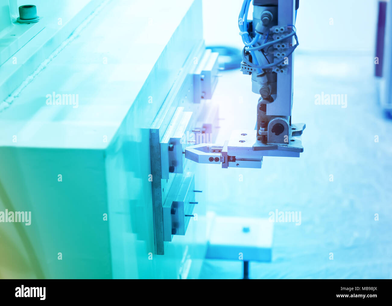 robotic hand machine tool at industrial manufacture factory Stock Photo ...