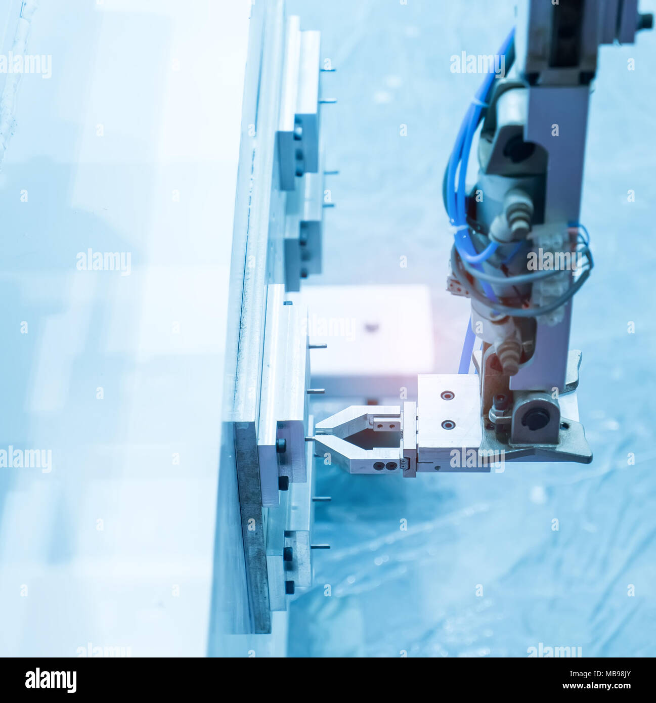 robotic hand machine tool at industrial manufacture factory Stock Photo ...