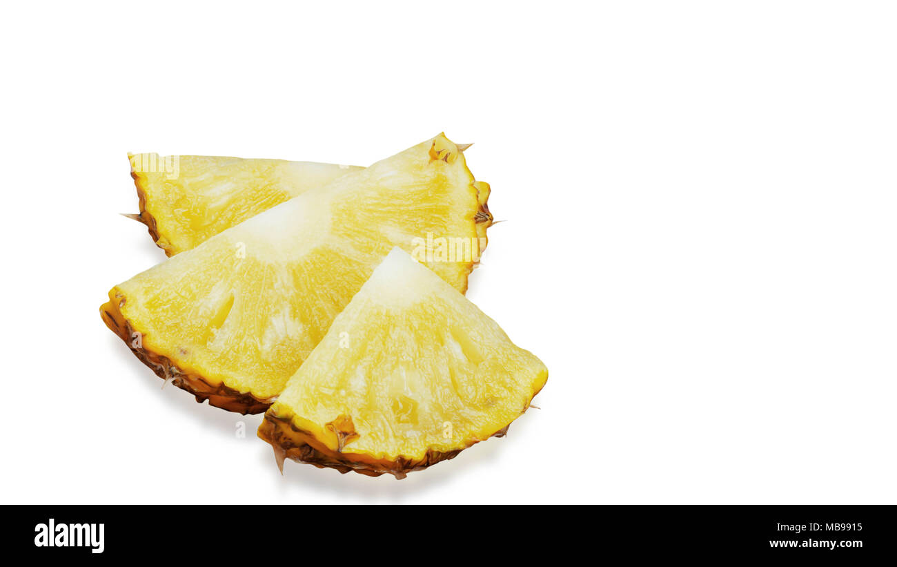 Pineapple ripe of slices on a white background Stock Photo - Alamy
