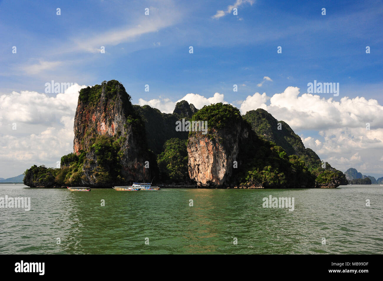 Colourful limestone karst rises out of the Andaman Sea, Phang Nga Bay ...