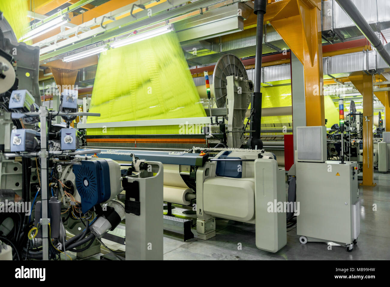 Machinery and equipment in the weaving shop, detailed review. interior ...