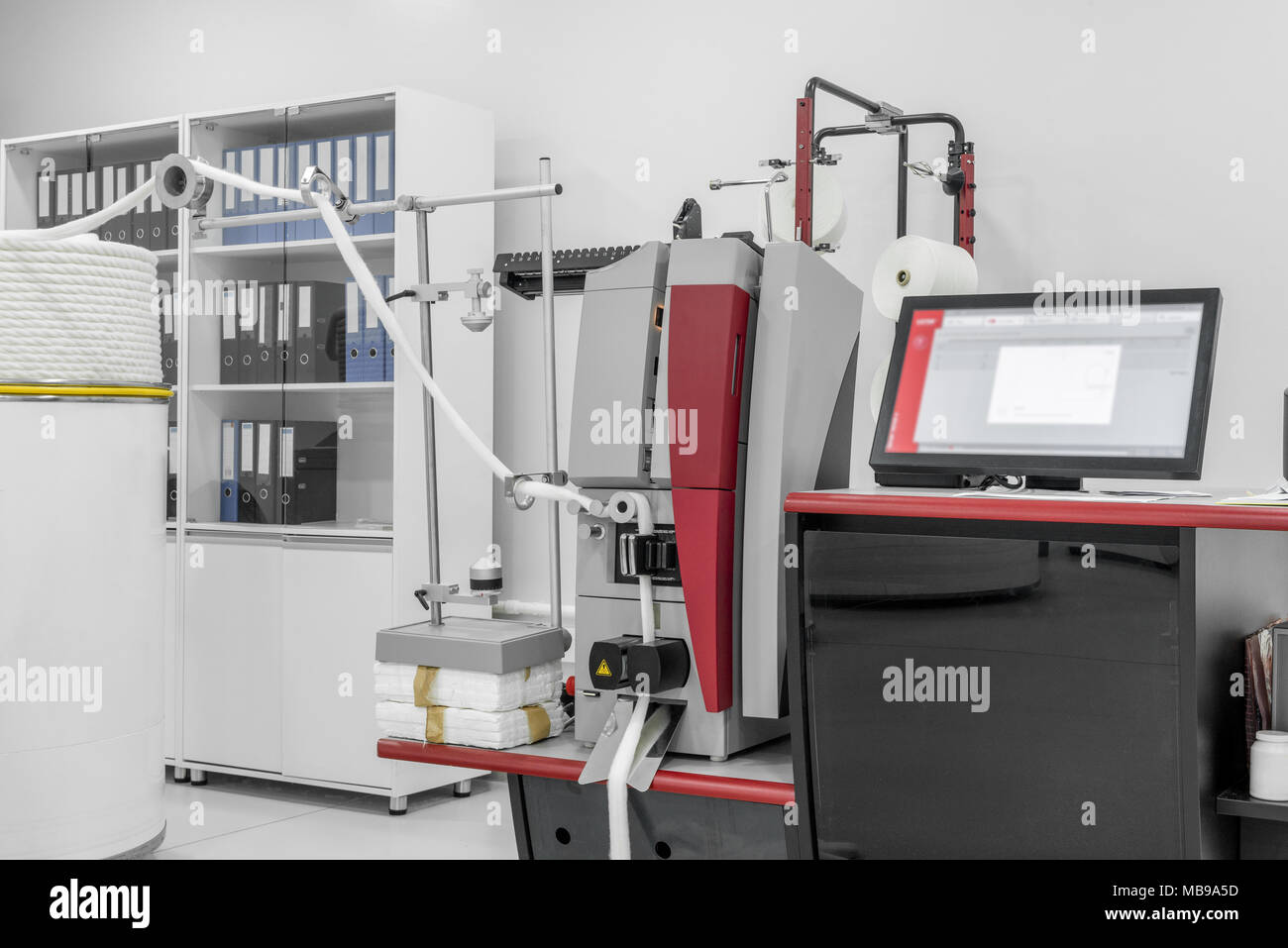 laboratory equipment checks the quality of cotton fiber in a textile ...