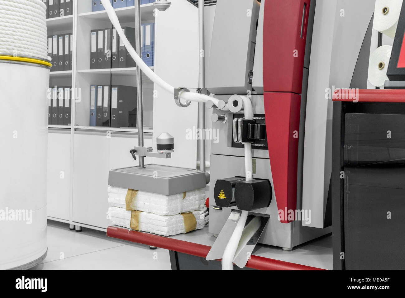 laboratory equipment checks the quality of cotton fiber in a textile ...