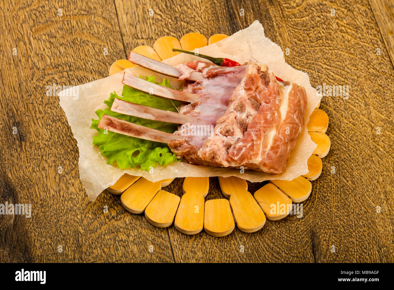 Raw lamb ribs with pepper ready for cooking Stock Photo - Alamy
