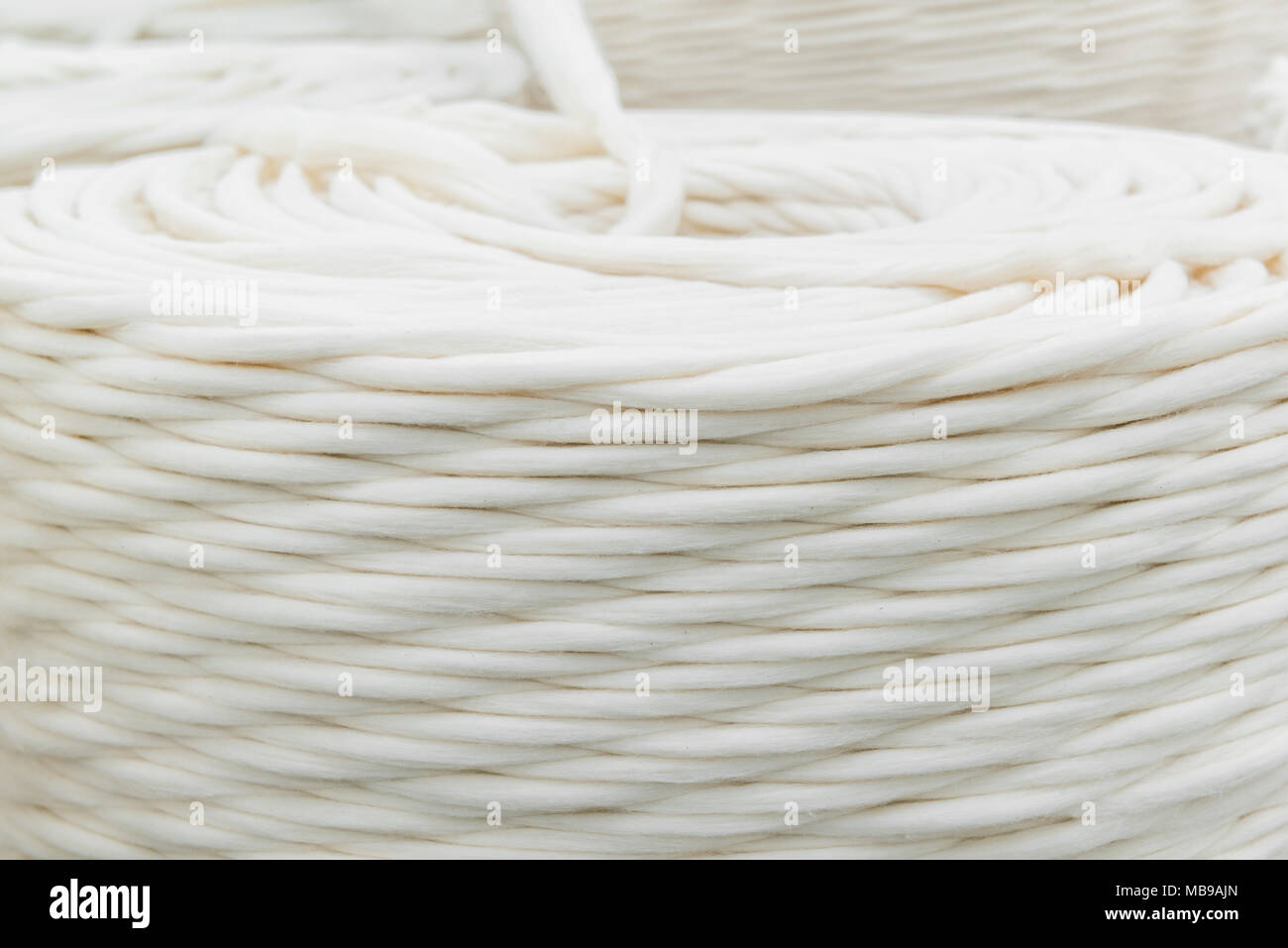 thick white thread twisted into a coil. close up Stock Photo - Alamy