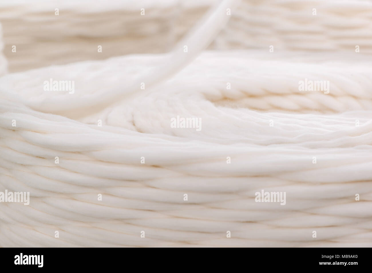 thick white thread twisted into a coil. closeup Stock Photo - Alamy