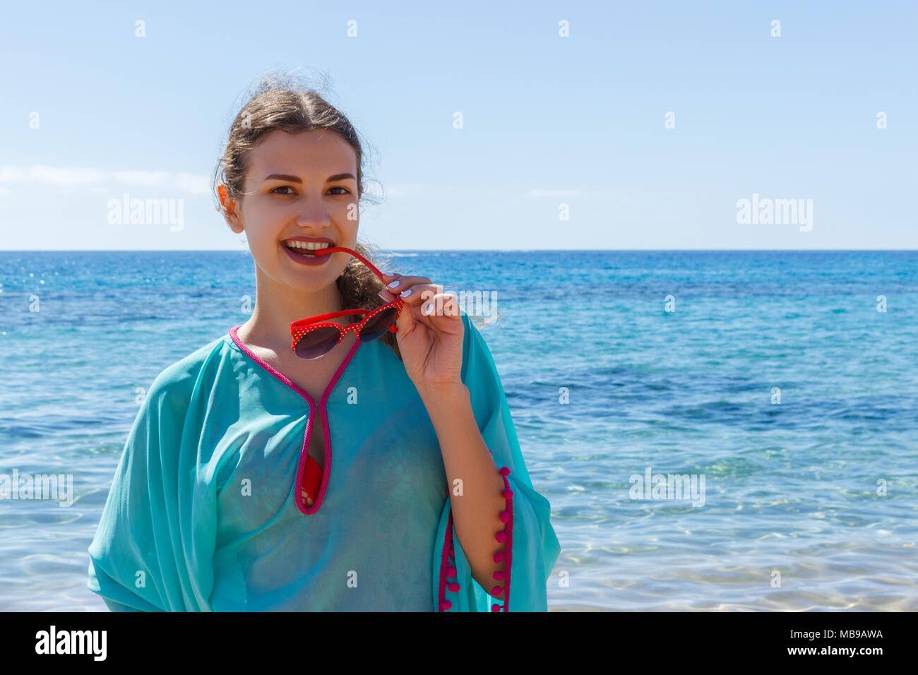 Young beautiful model relaxing on a beach in the summer Stock Photo - Alamy