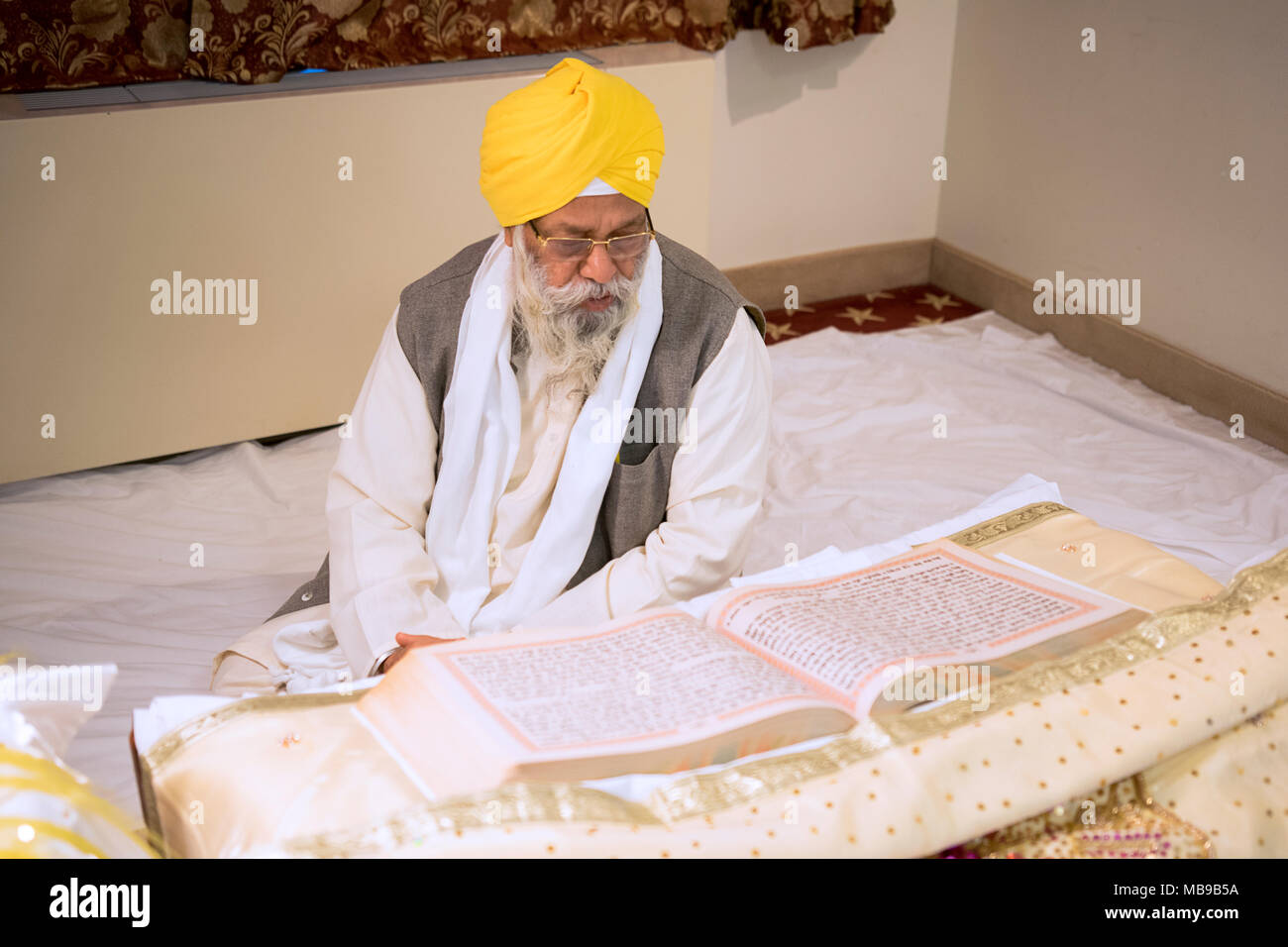 Sikh priest sri guru granth sahib hi-res stock photography and images ...