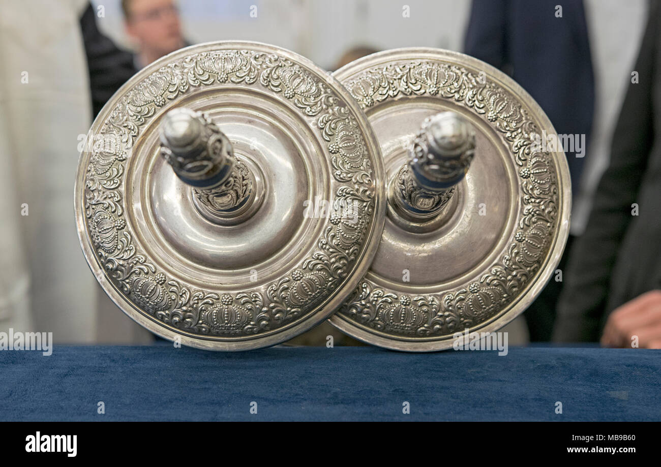 The ornate silver handles of a Torah that was being used in a synagogue ...