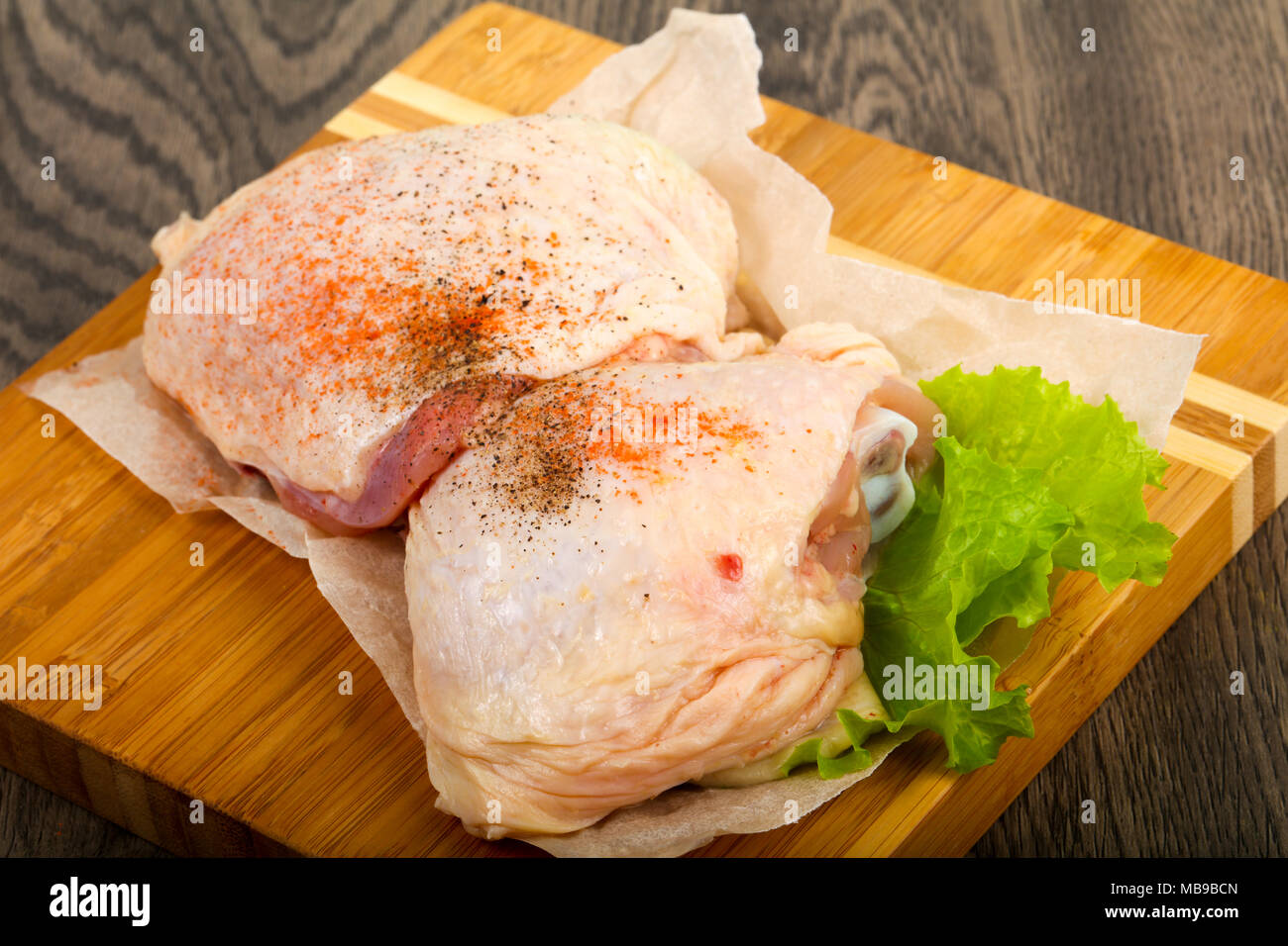 Raw chicken thighs ready for cooking Stock Photo - Alamy