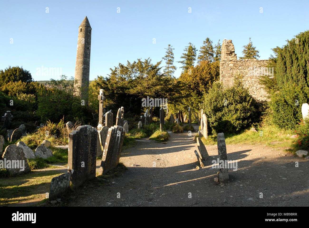 The 30 meters high Round Tower at Glendalough is in the valley of two ...